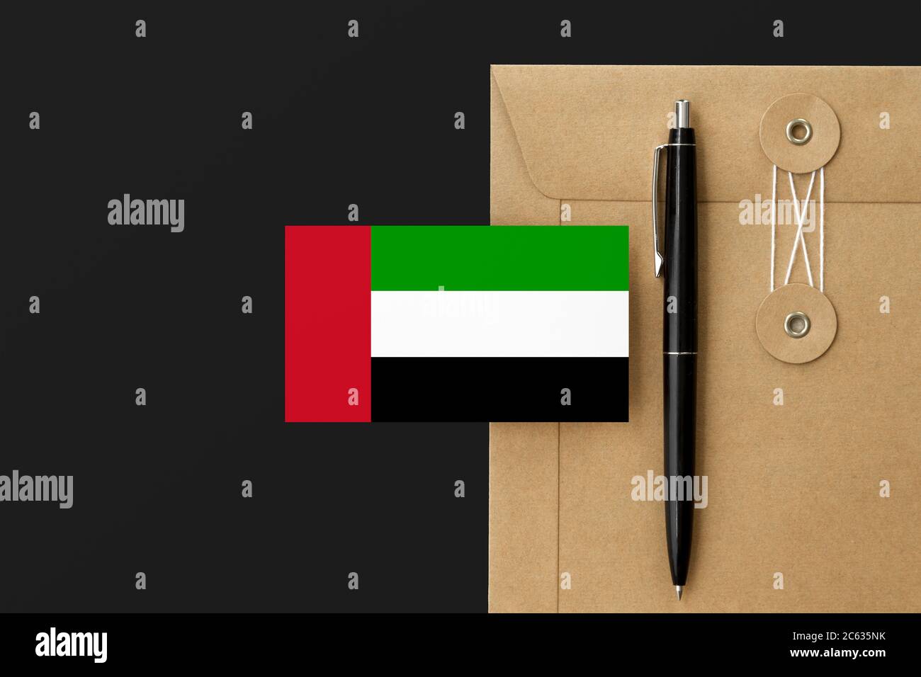United Arab Emirates flag on craft envelope letter and black pen ...