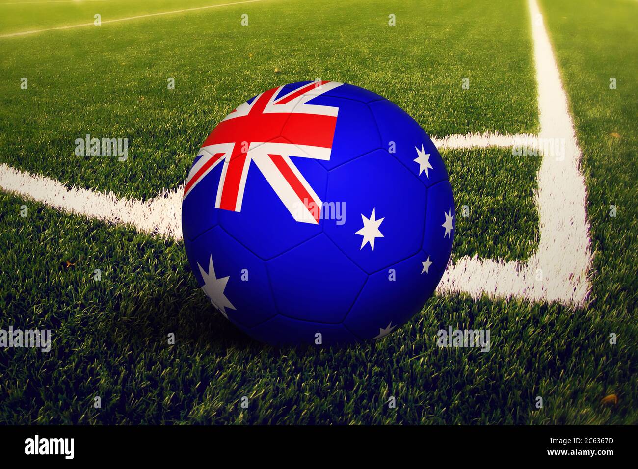 Australia flag on ball at corner kick position, soccer field background ...