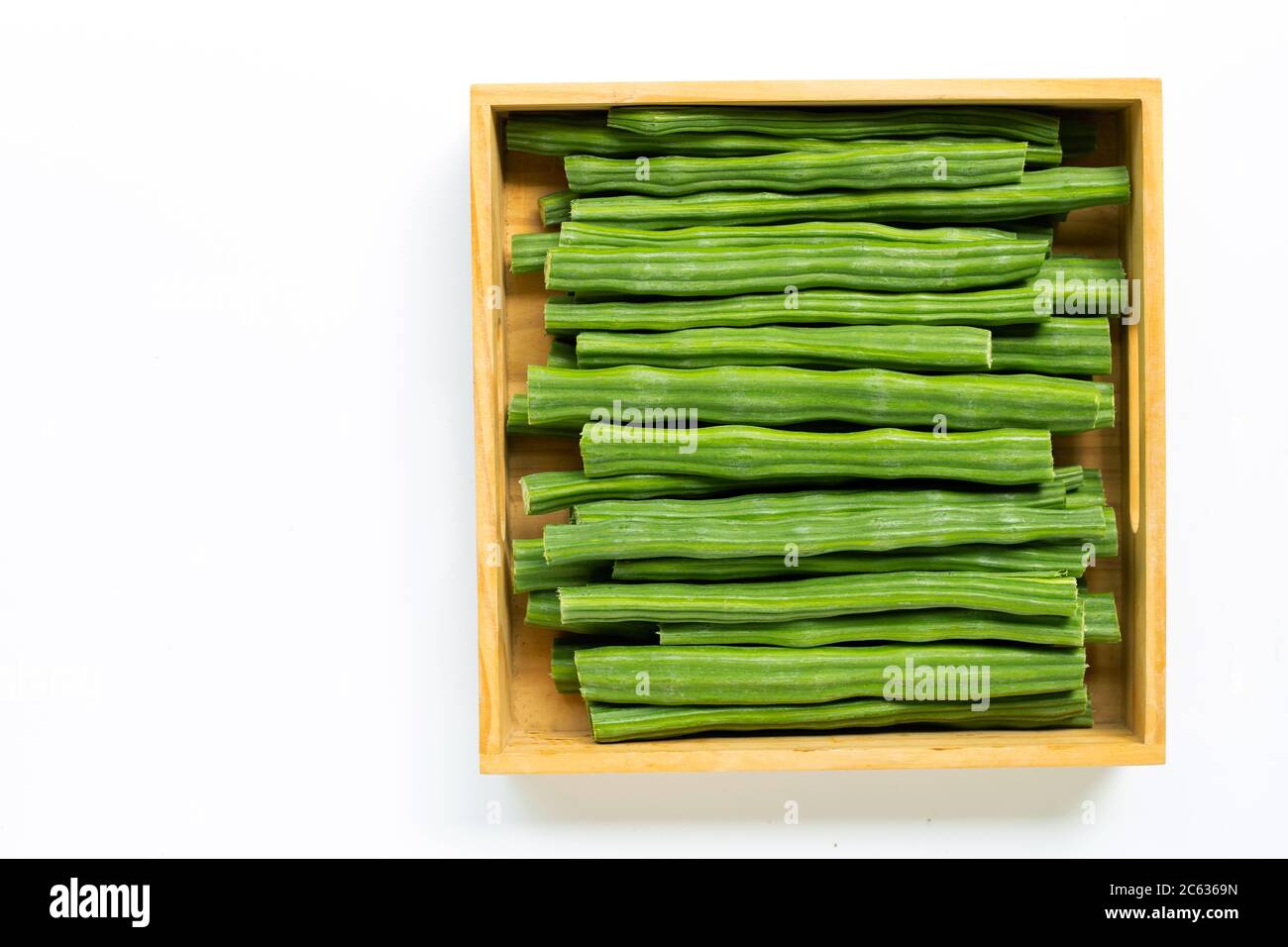 Moringa oleifera in wooden box isolated on white background Stock Photo ...