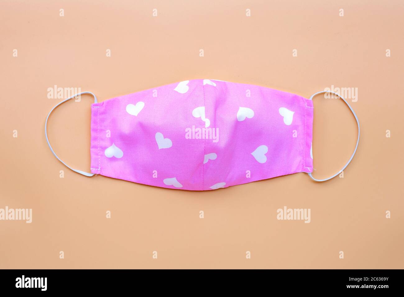 Pink cloth mask hi-res stock photography and images - Alamy