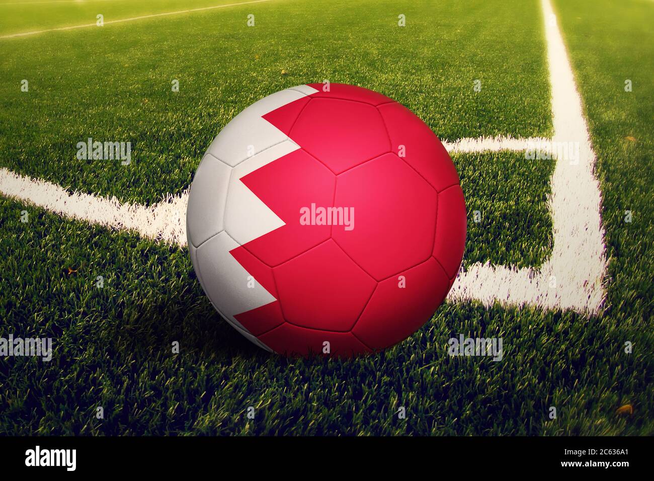 Bahrain flag on ball at corner kick position, soccer field background ...