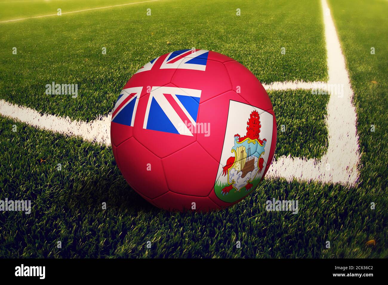 Bermuda flag on ball at corner kick position, soccer field background ...