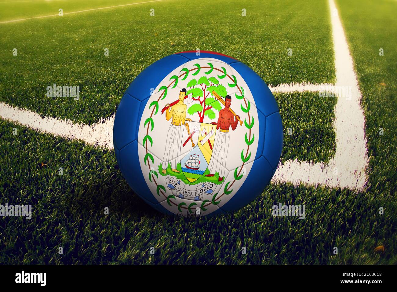 Belize flag on ball at corner kick position, soccer field background ...