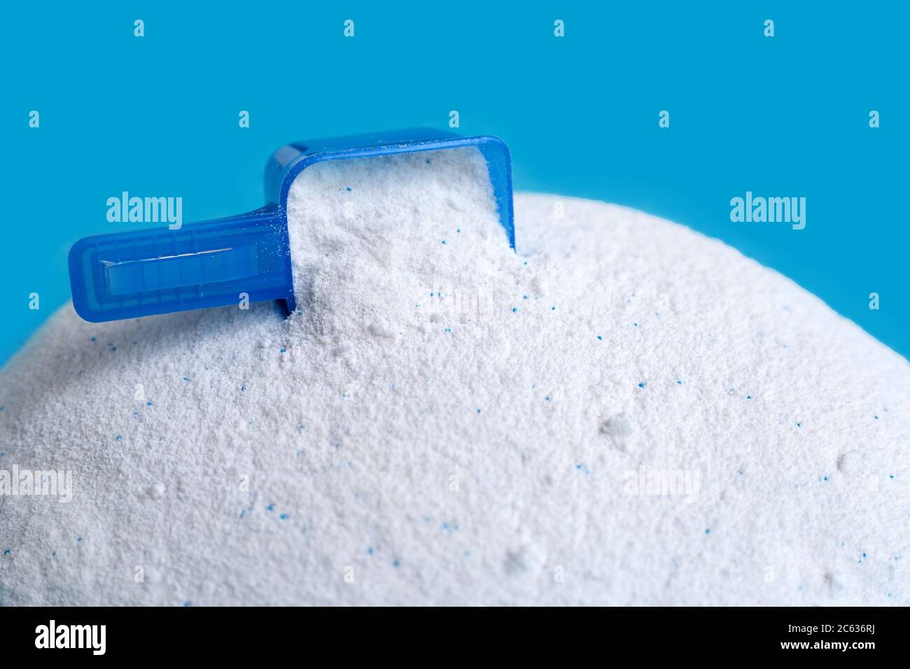 Detergent powder with measuring spoon for clothes washing. Laundry ...