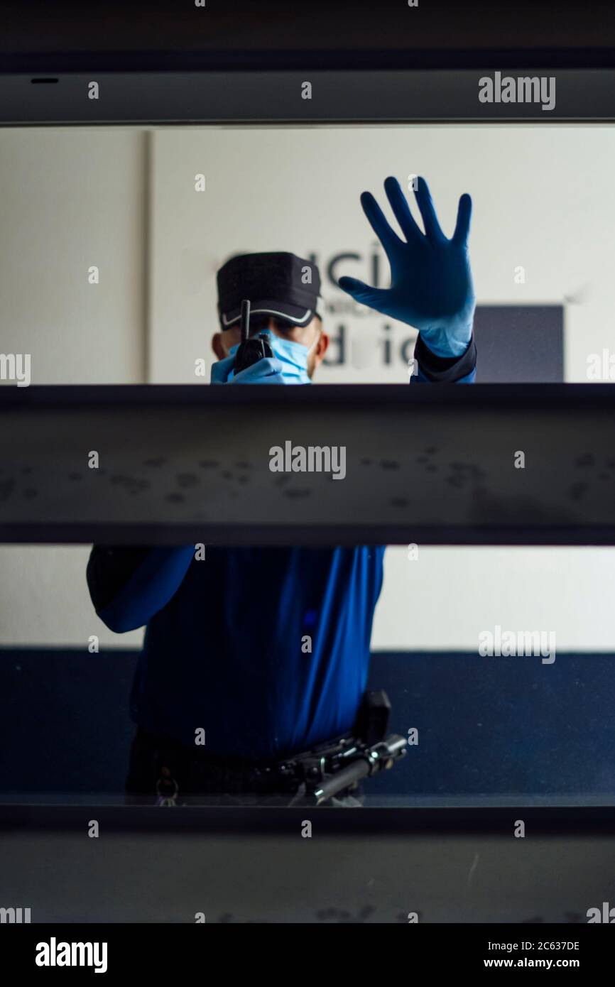 police talking on their station leaning against the window Stock Photo ...