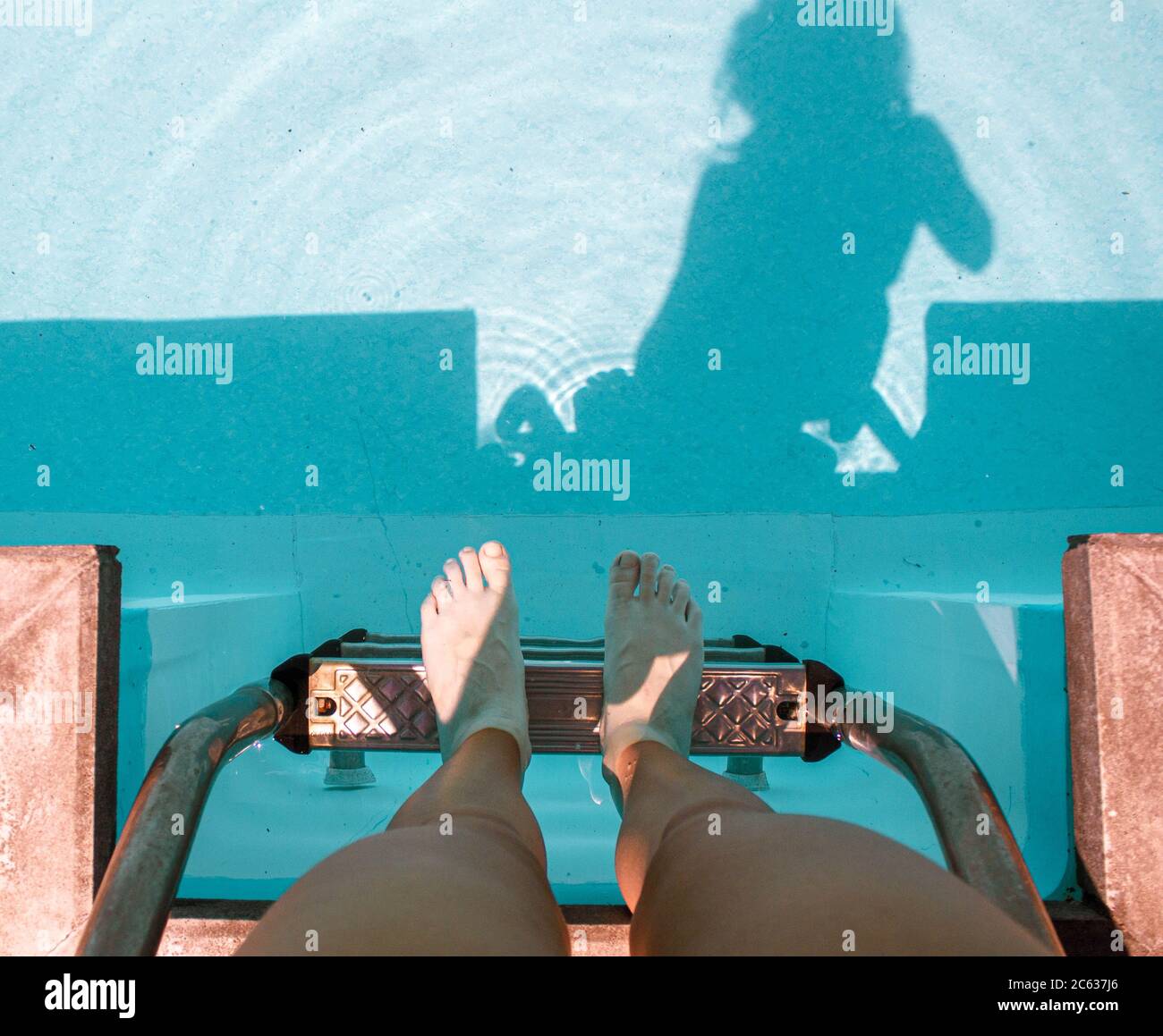 Pool shadow woman feet hi-res stock photography and images - Alamy