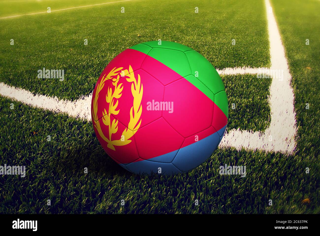 Eritrea flag on ball at corner kick position, soccer field background ...