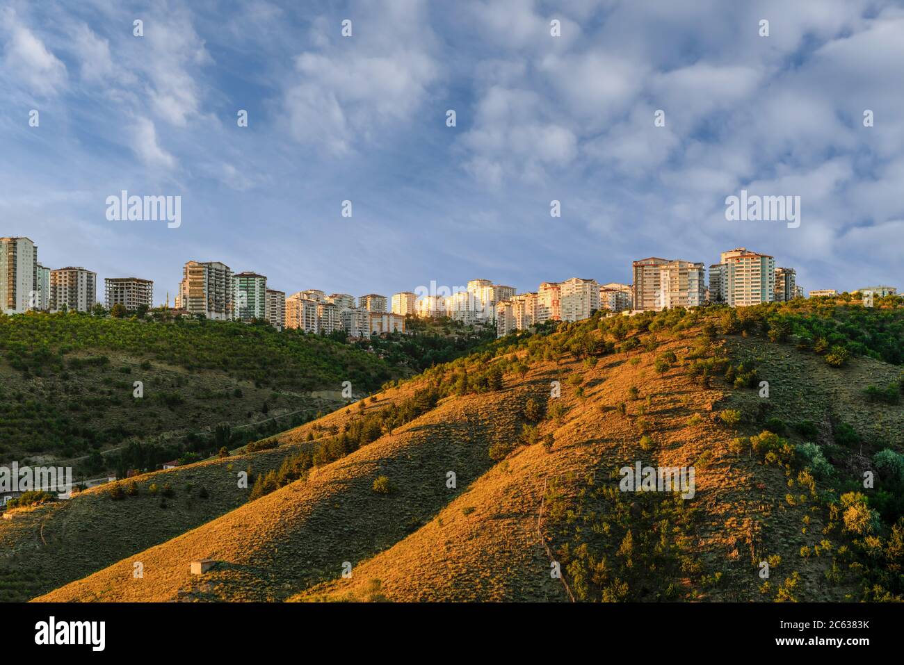 Apartment buildings on the top of the hills at sunset, Ankara, Turkey ...
