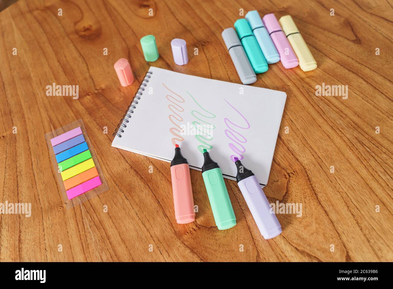Drawing on a white sheet with a color highlighter. Top View Stock Photo ...