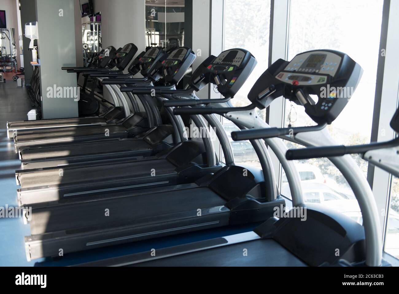 Modern Gym Room Fitness Center With Equipment And Machines Stock Photo ...