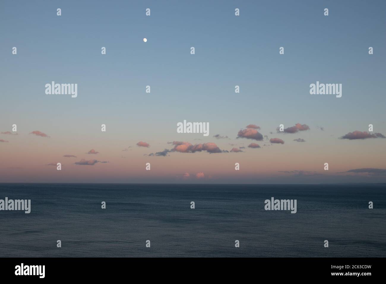 View of beautiful sky with sea and Moon Stock Photo - Alamy