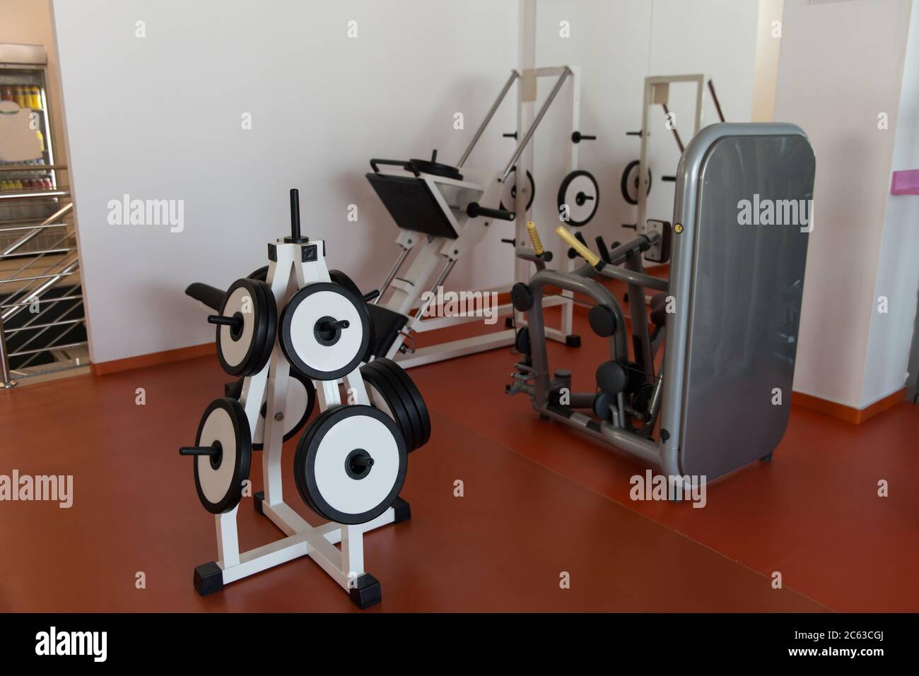 Modern Gym Room Fitness Center With Equipment And Machines Stock Photo ...