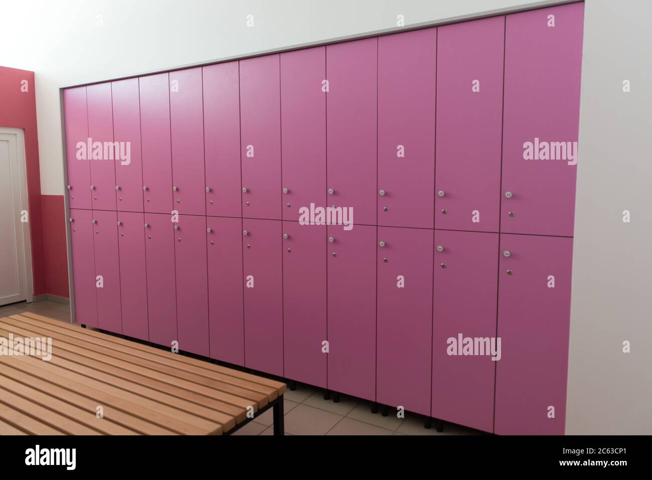 Modern Interior Of A Pink Locker Changing Room In Fitness Center Gym ...