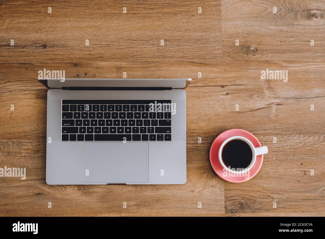 Laptop and cup of coffee Stock Photo - Alamy