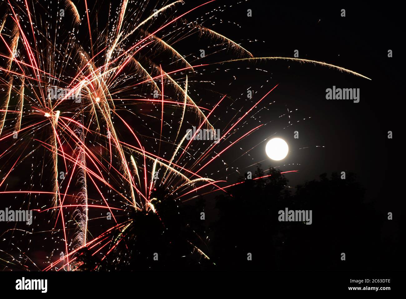 Fireworks and full moon on Independence Day, July 4th Stock Photo - Alamy