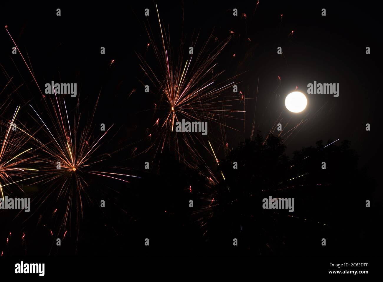 Fireworks and full moon on Independence Day, July 4th Stock Photo - Alamy