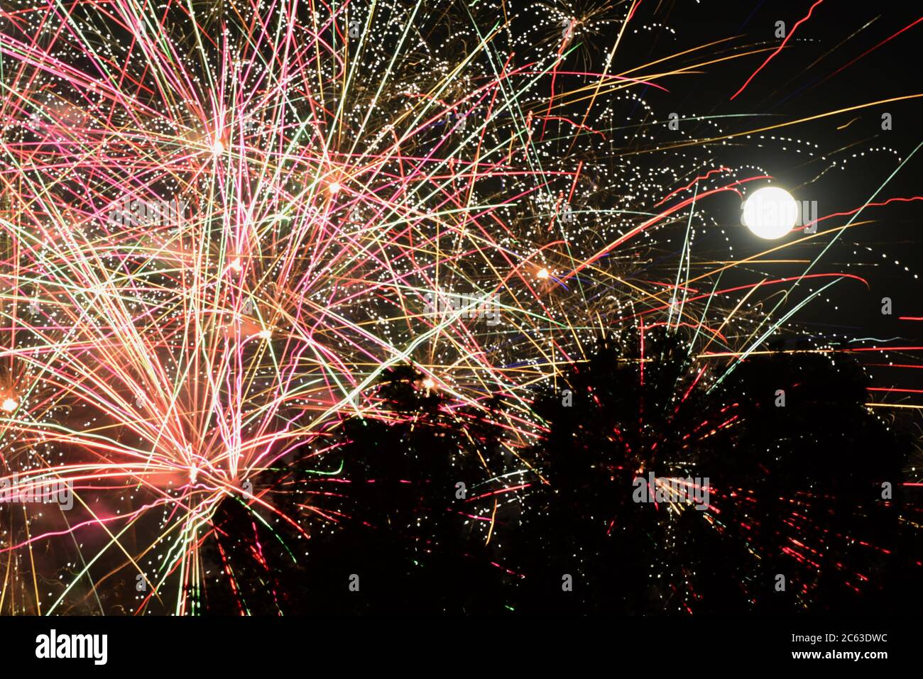 Fireworks and full moon on Independence Day, July 4th Stock Photo - Alamy