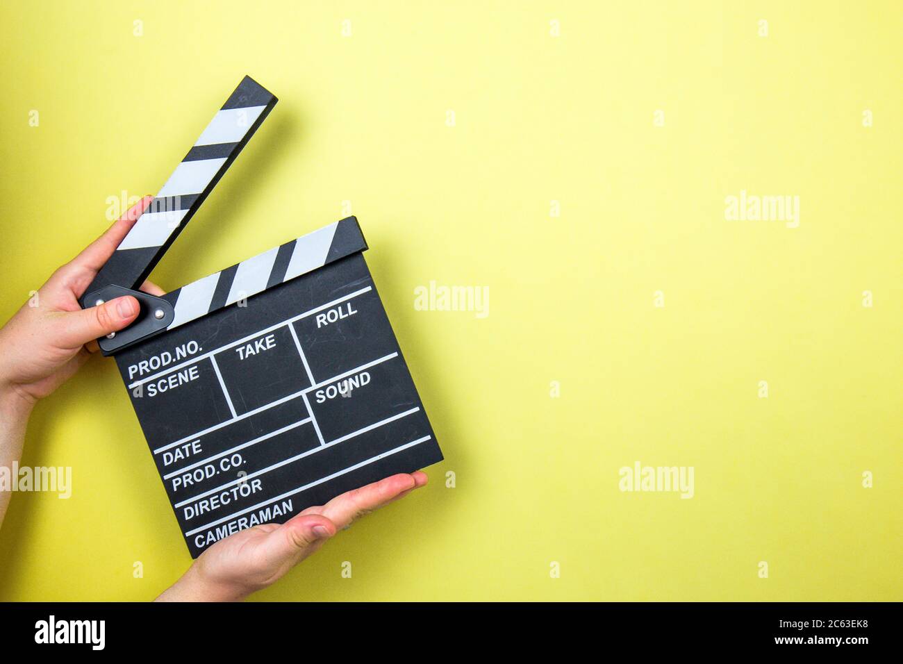 Movie clapper on yellow background, cinema concept Stock Photo - Alamy