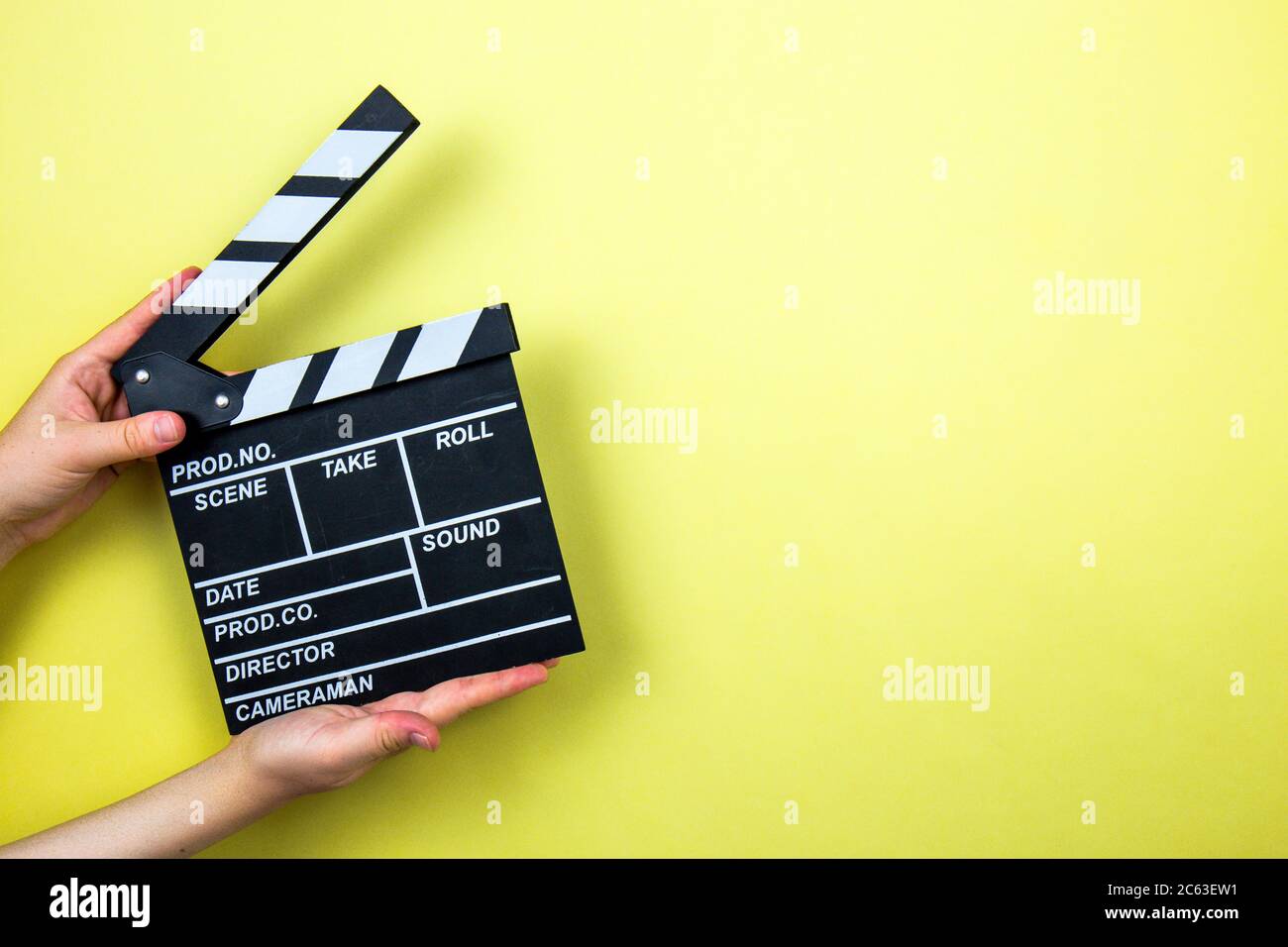 Movie clapper on yellow background, cinema concept Stock Photo - Alamy