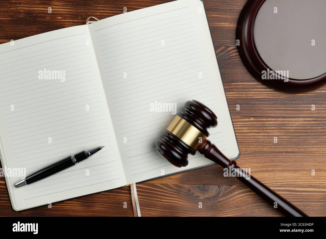 notebook on wood background Stock Photo - Alamy