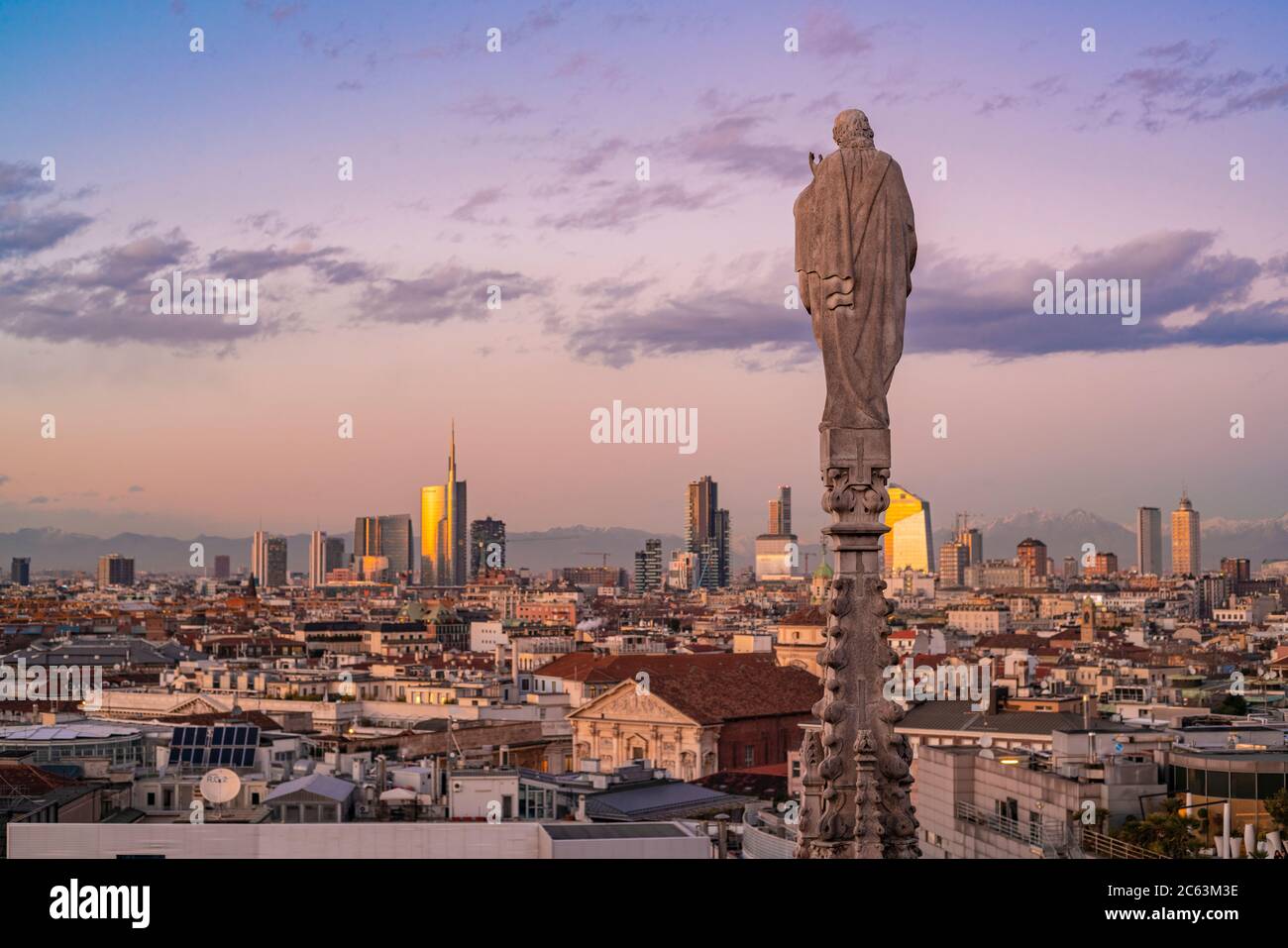 View of the statues on the Cathedral of Milan and the skyline of Milan ...