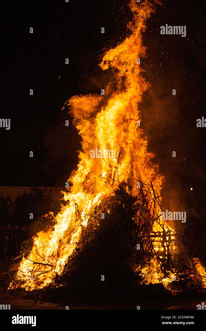 Impressive bonfire burning in the middle of a square Stock Photo - Alamy