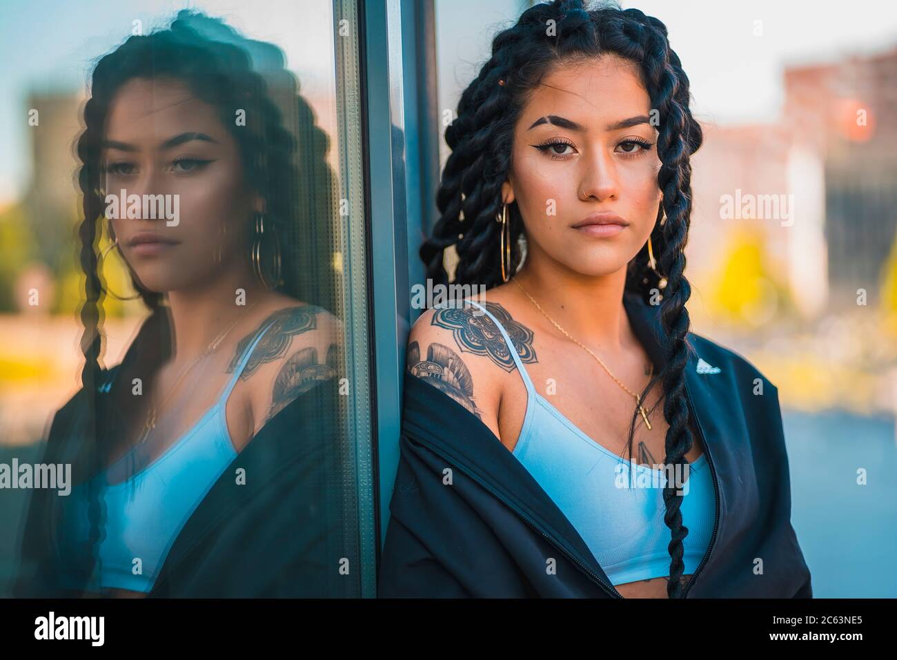Ethnic girl staring hi-res stock photography and images - Alamy