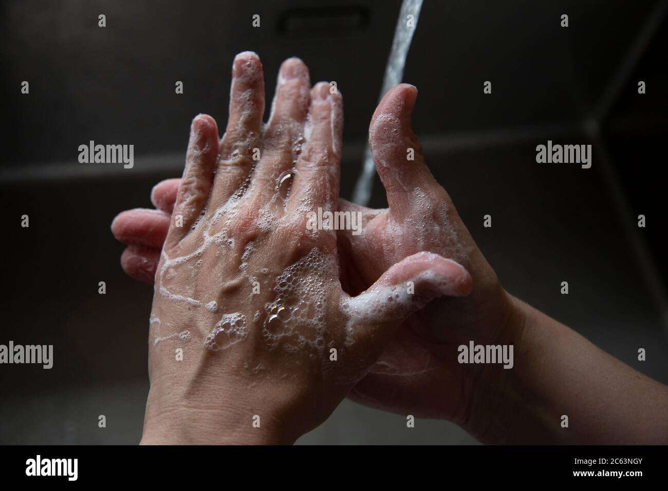 Soapy hands scrub hi-res stock photography and images - Alamy