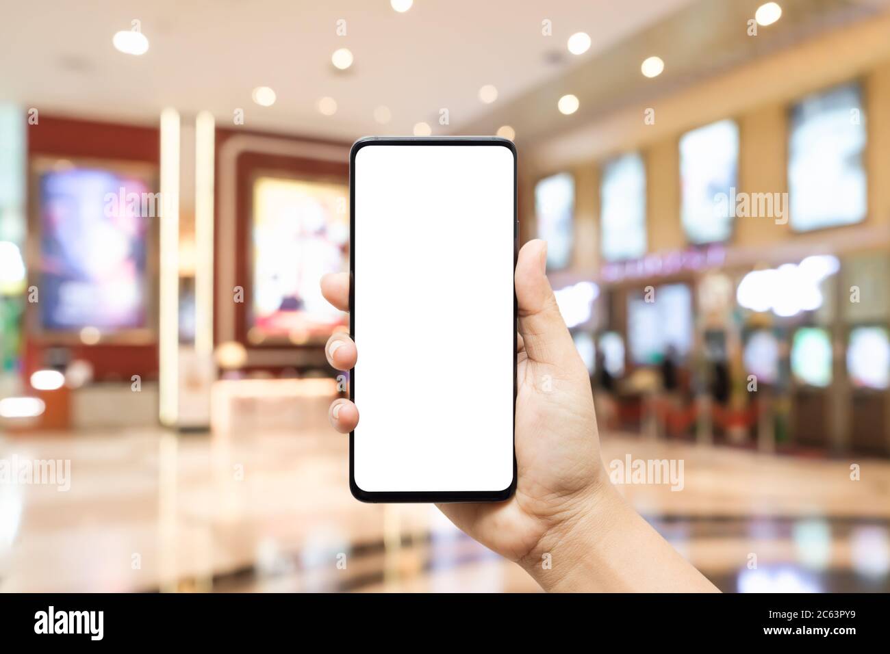 Mockup blank white screen mobile phone hand holding smartphone with ...