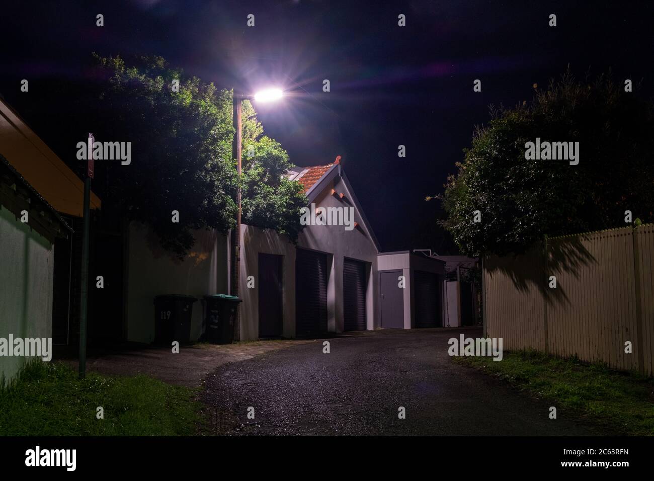 empty old back street at night Stock Photo - Alamy