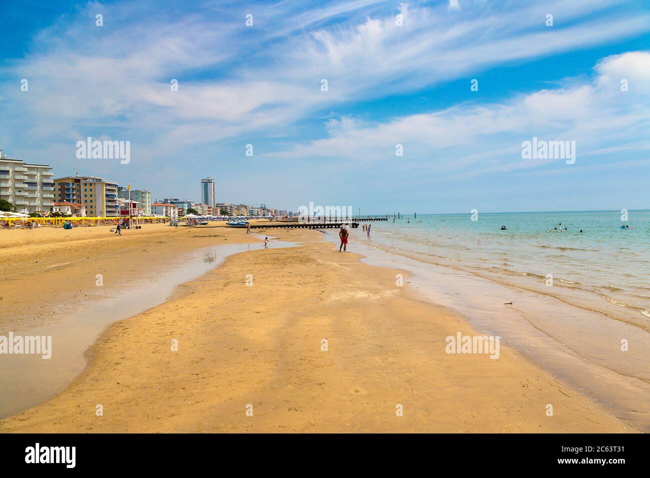 Beach of Lido di Jesolo at adriatic Sea in a beautiful summer day ...