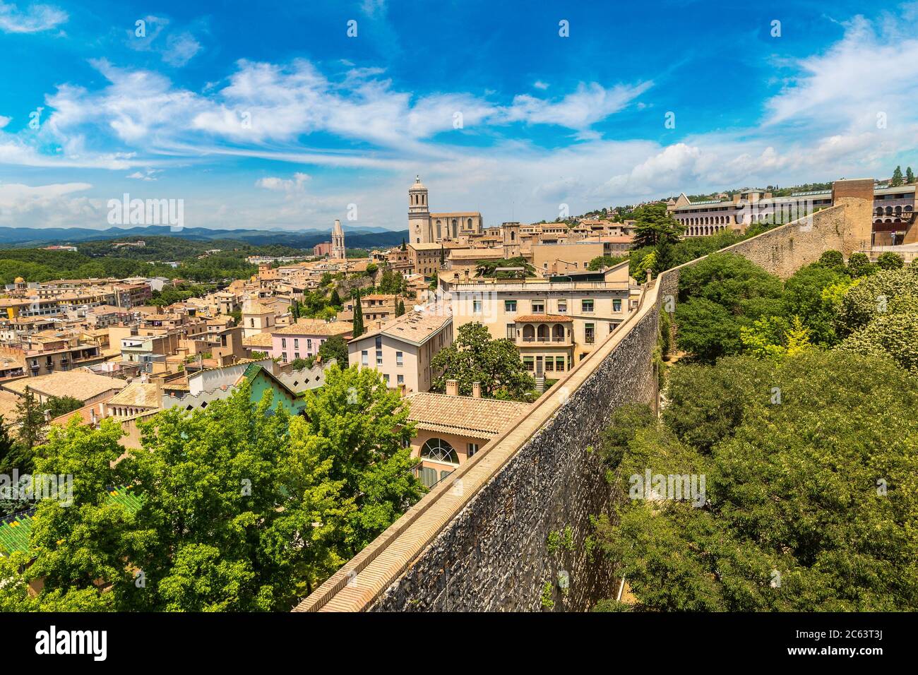 Panoramic aerial view of Girona and cathedral in a beautiful summer day ...