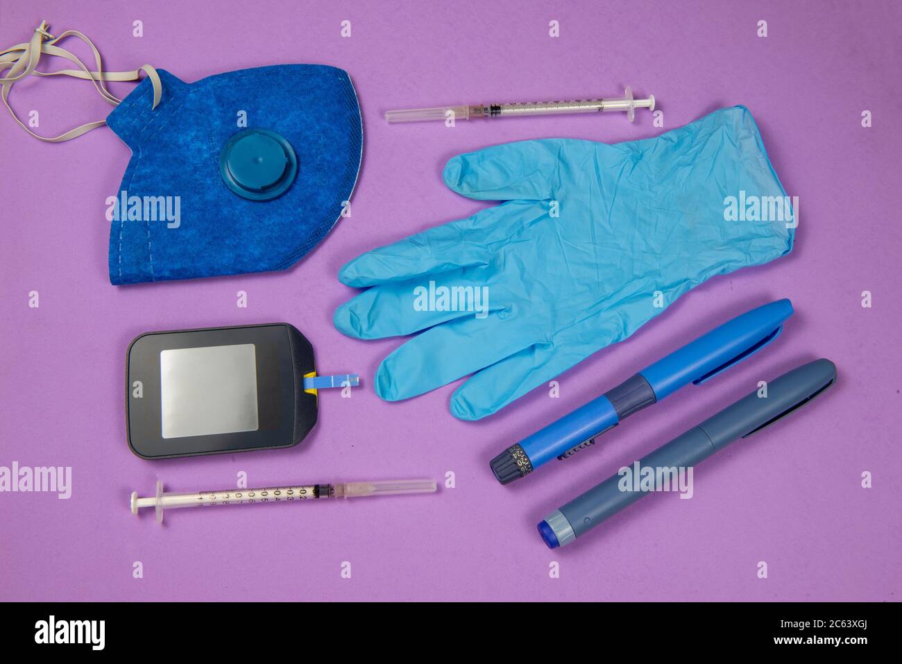 Objects that represent diabetes and safety protection due to pandemic ...