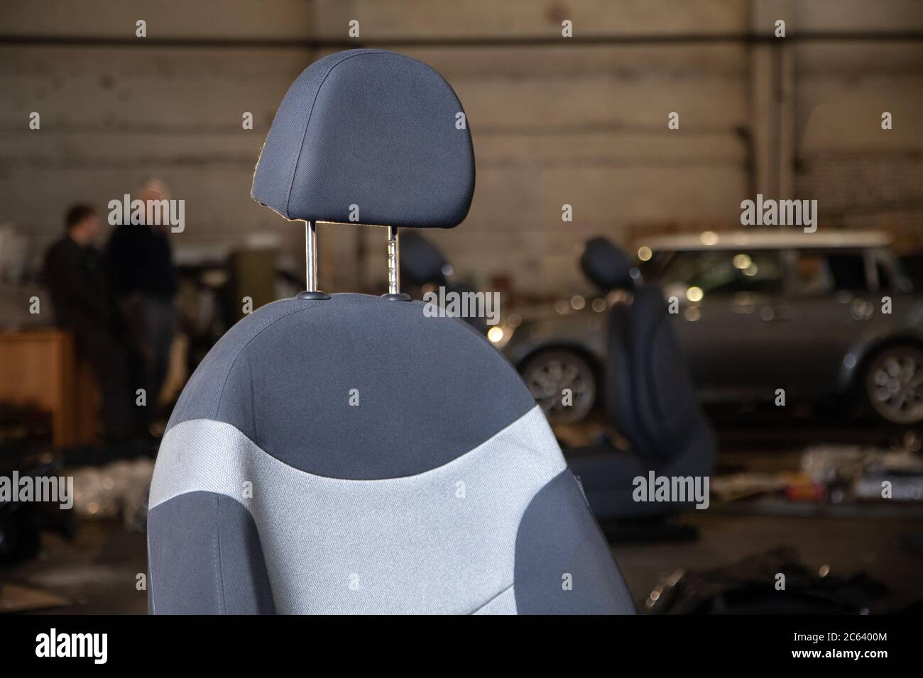 Auto interior: driver seats in black textile Stock Photo - Alamy