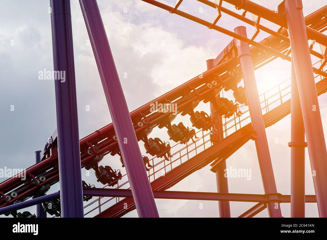 Roller coaster in the amusement park with the sunset background Stock ...
