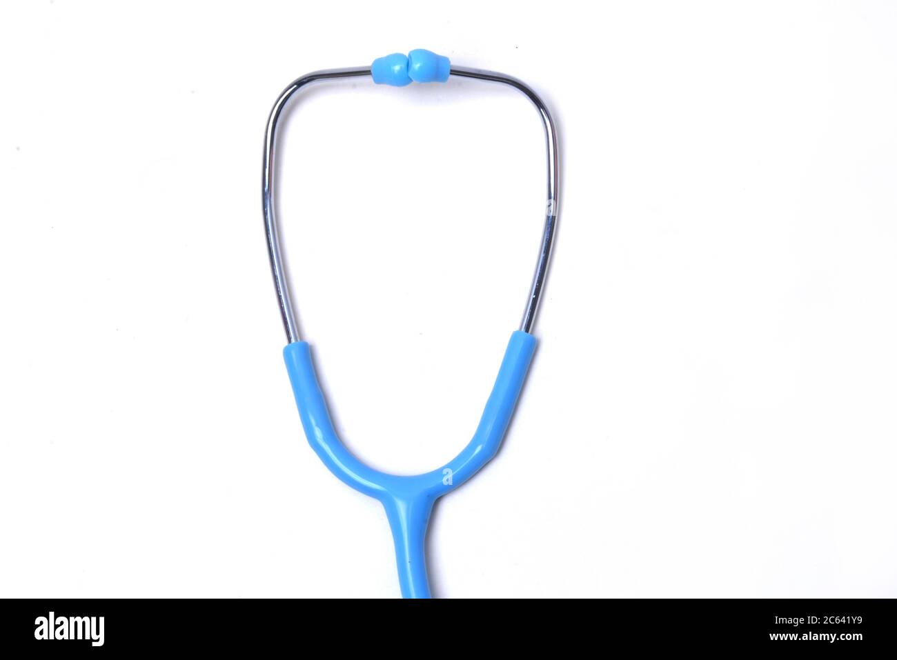 Blue stethoscope isolated over white background Stock Photo - Alamy