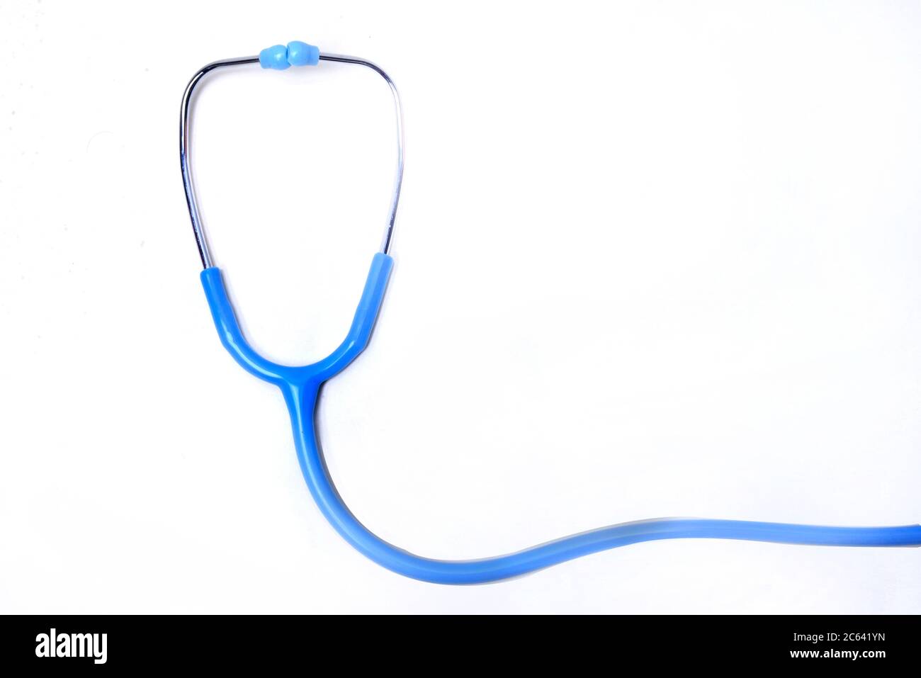 Blue stethoscope isolated over white background Stock Photo - Alamy