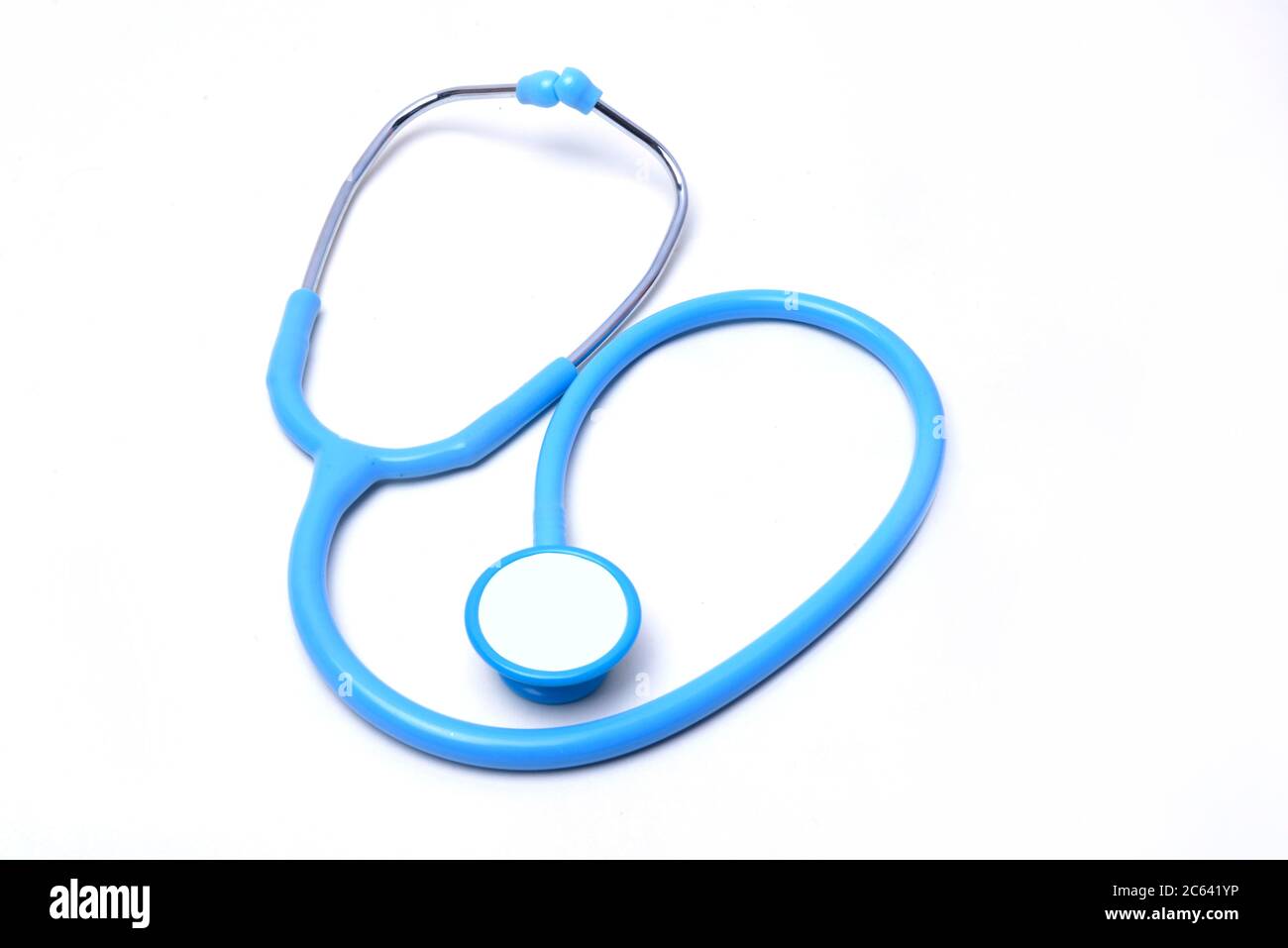Blue stethoscope isolated over white background Stock Photo - Alamy