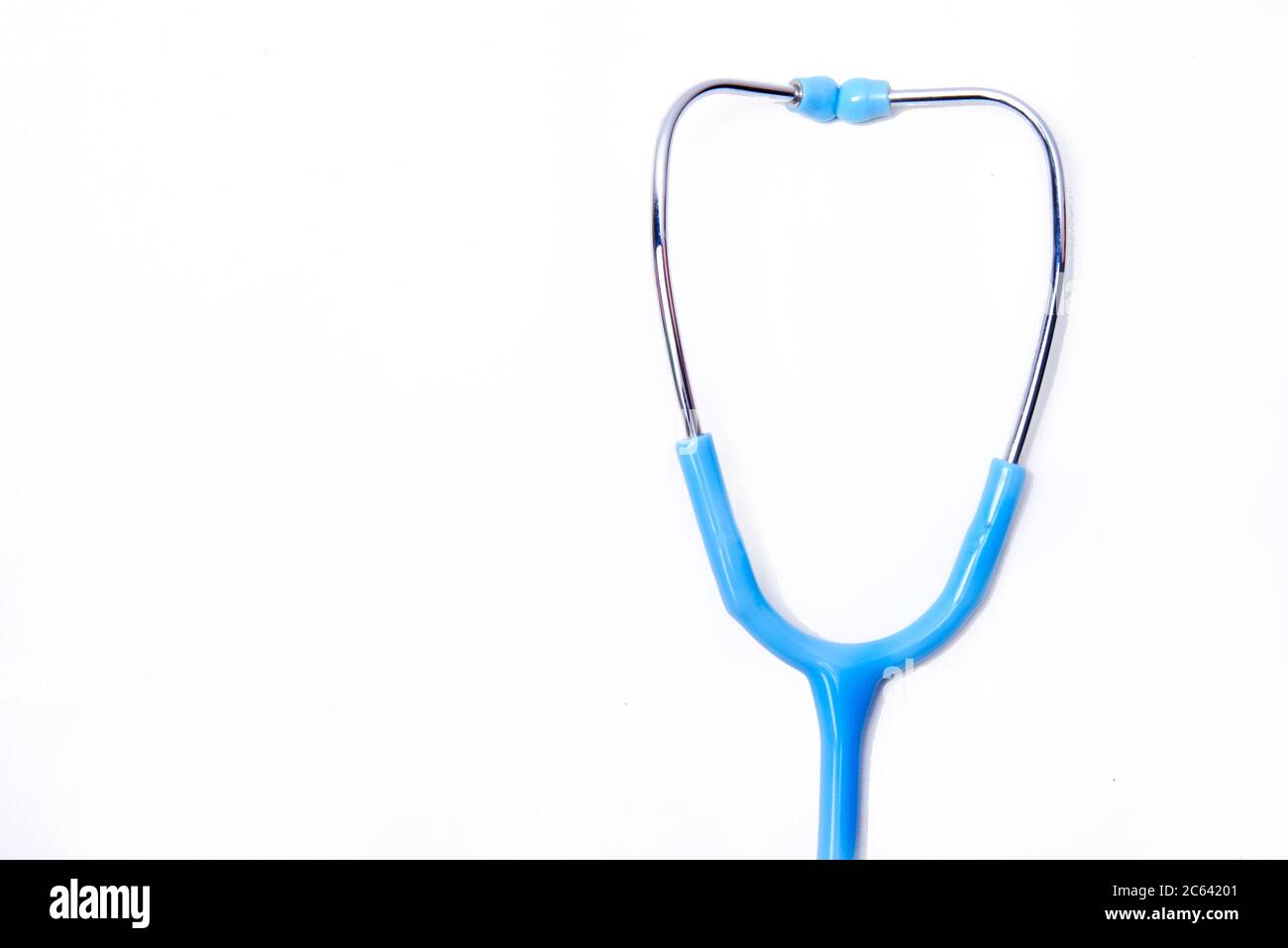 Blue stethoscope isolated over white background Stock Photo - Alamy