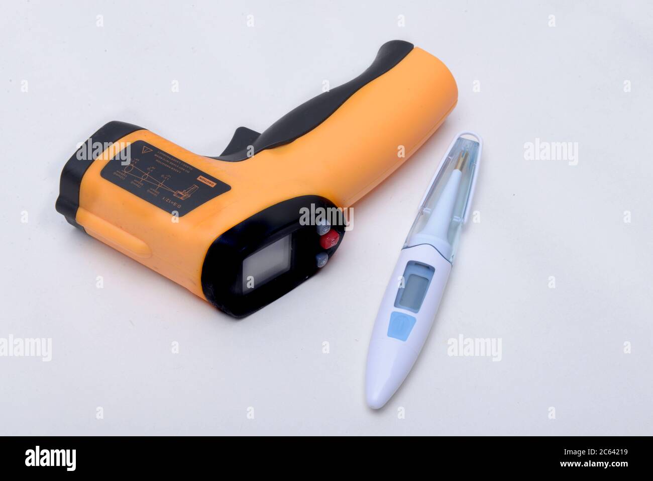 Digital thermometer isolated over white background Stock Photo - Alamy