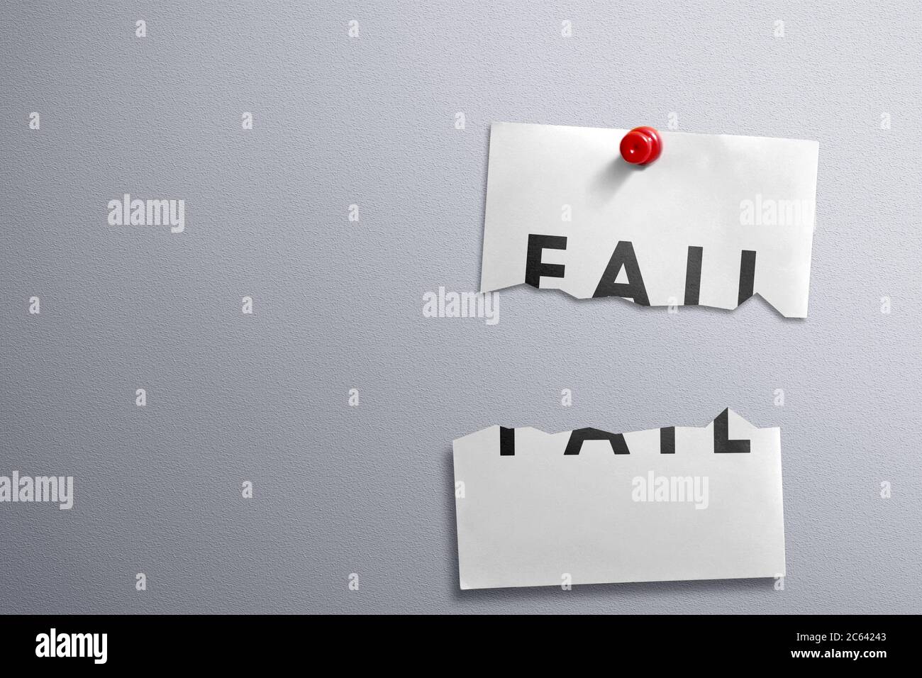 Ripped paper with Fail text hanging on the wall Stock Photo - Alamy