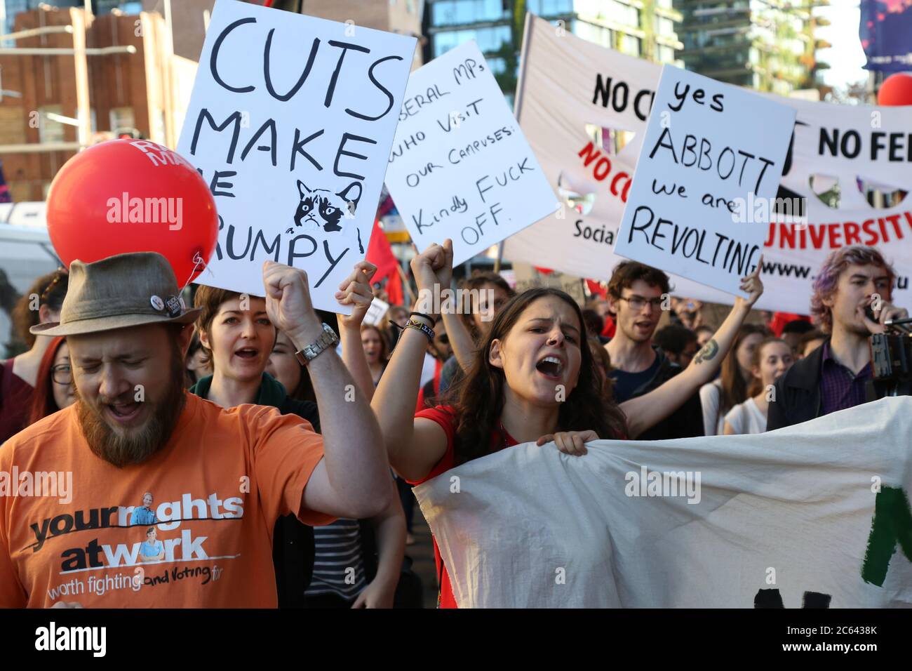 Student protesters march along George Street in Sydney. One of the ...