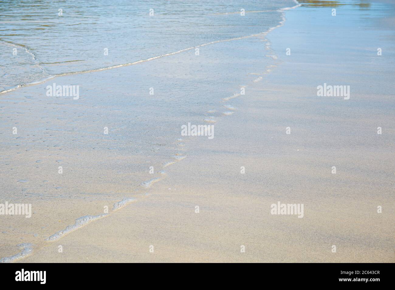 Sand beach with the sunlight at sea Stock Photo - Alamy