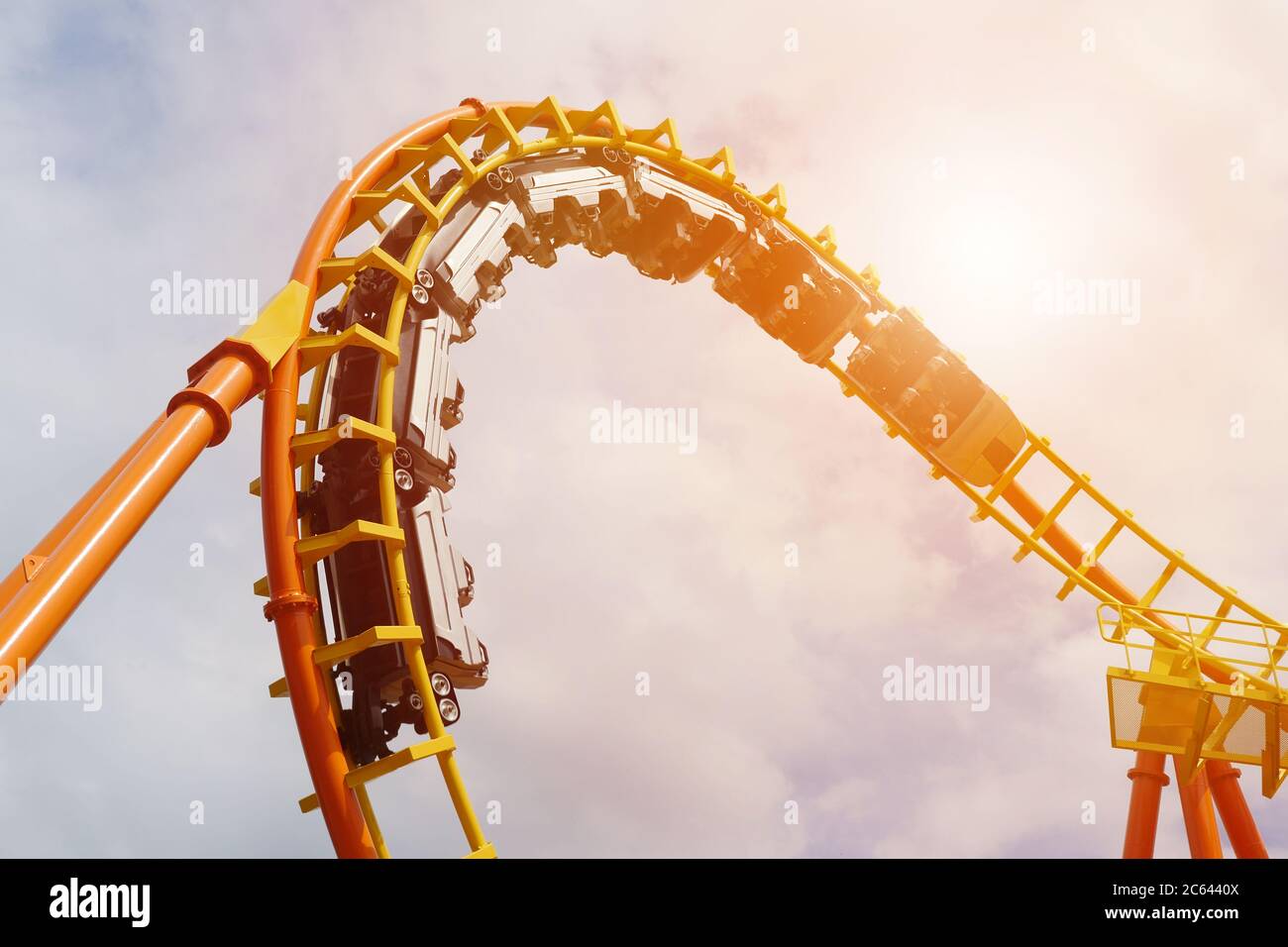 Roller coaster in the amusement park with the sunset background Stock ...