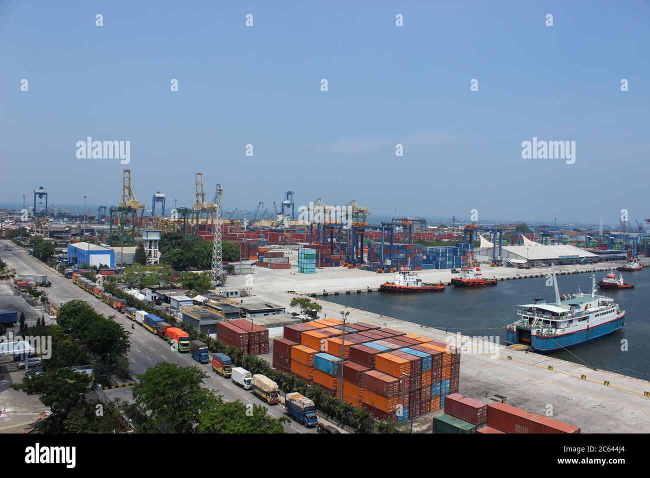 Loading and unloading shipping cargo with industrial crane. Export and ...