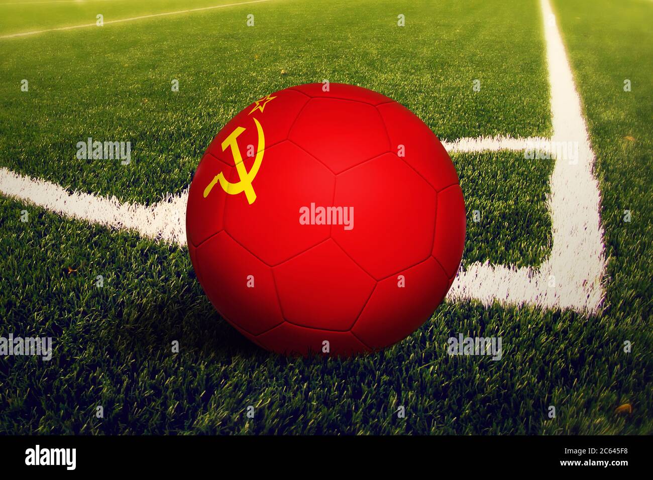 Soviet Union flag on ball at corner kick position, soccer field ...