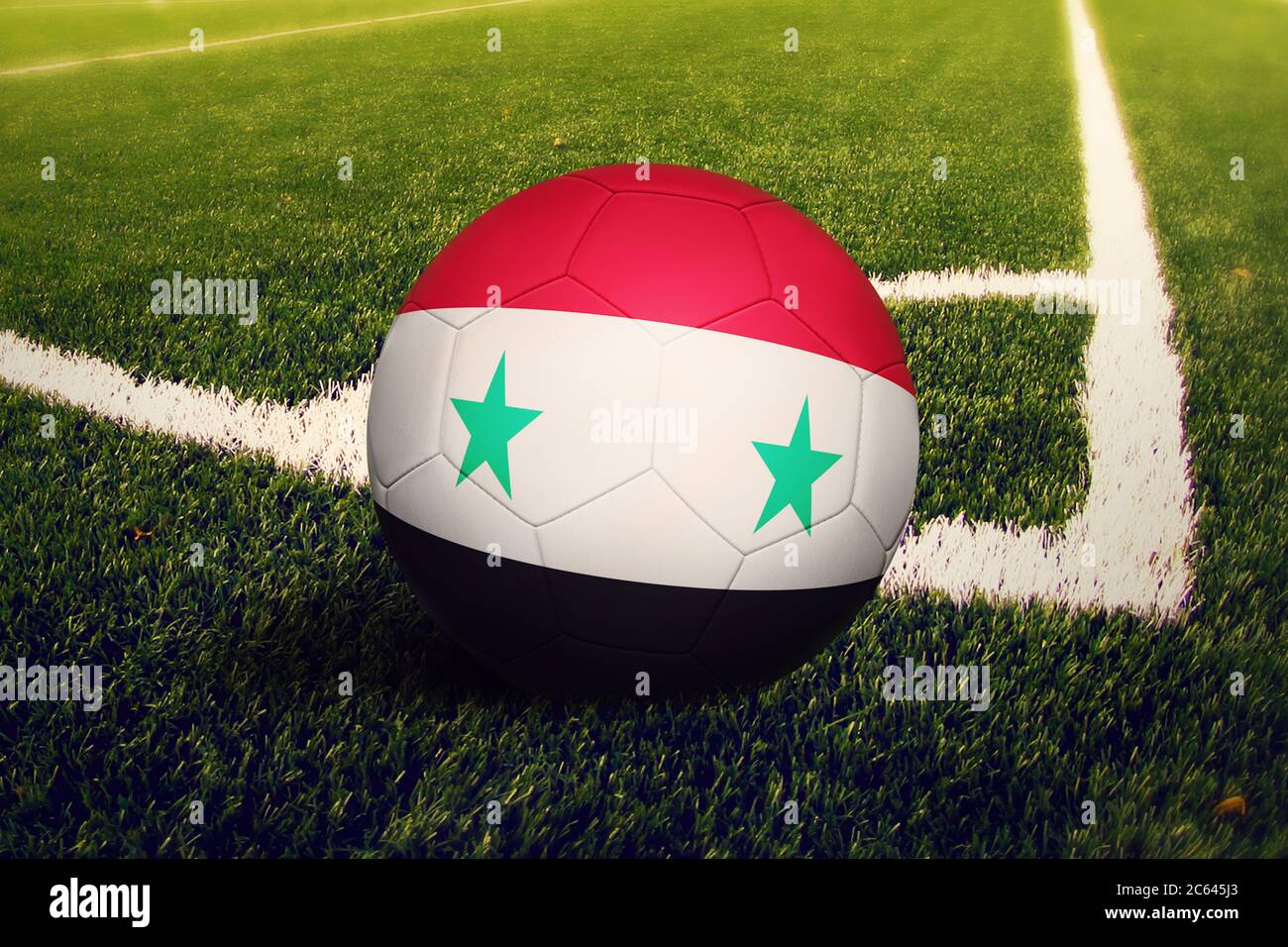 Syria flag on ball at corner kick position, soccer field background ...