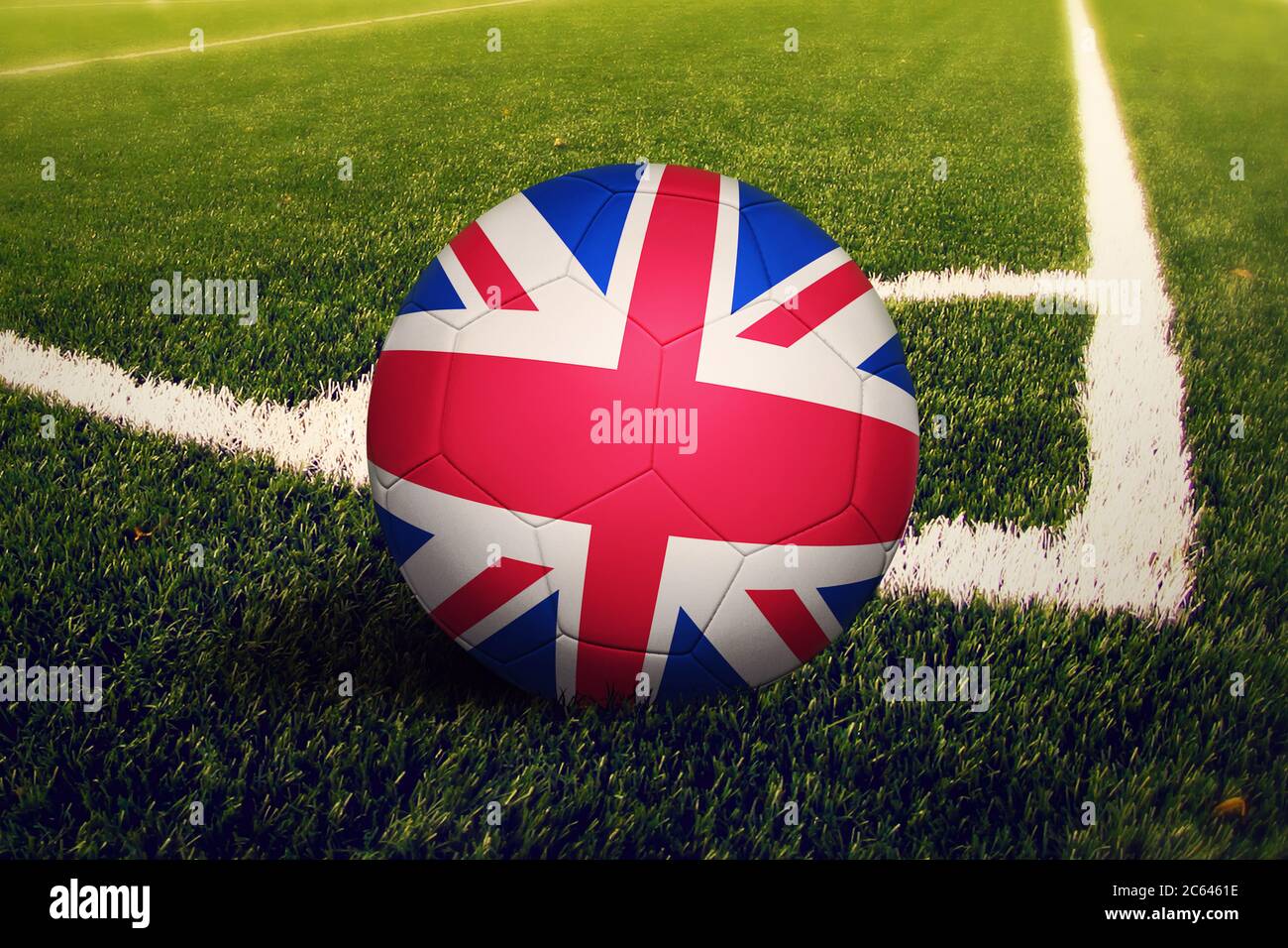 United Kingdom flag on ball at corner kick position, soccer field ...