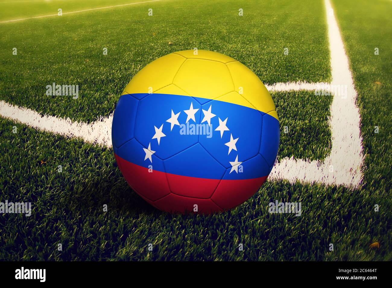 Venezuela flag on ball at corner kick position, soccer field background ...