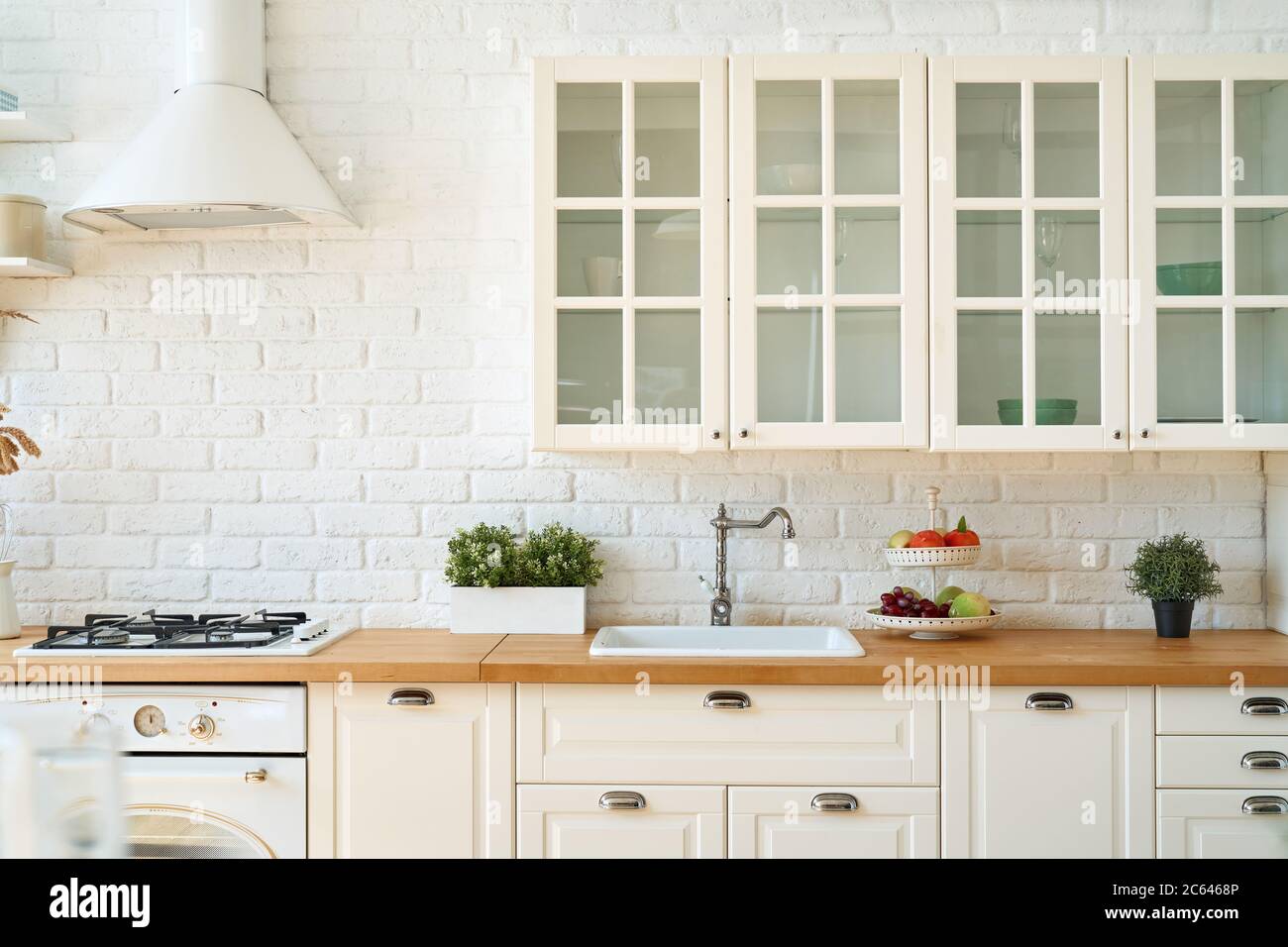 Kitchen interior with kitchen utensils and kitchen stove. Scandi style ...